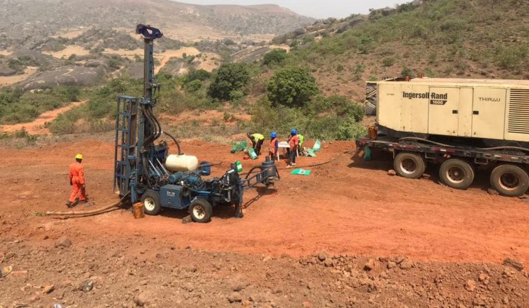 Creating an access road and clearing the drill pads on these steep ...